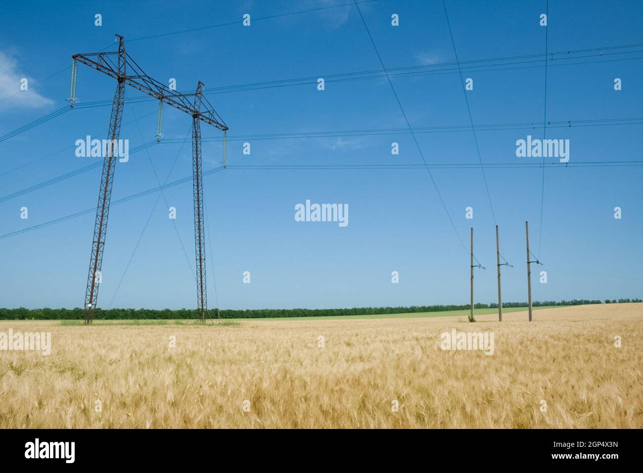 Power line supports. Electricity transmission and posts Stock Photo - Alamy