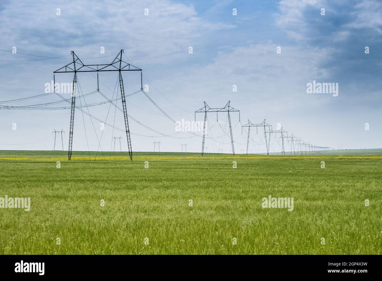 Power line supports. Electricity transmission and posts Stock Photo - Alamy