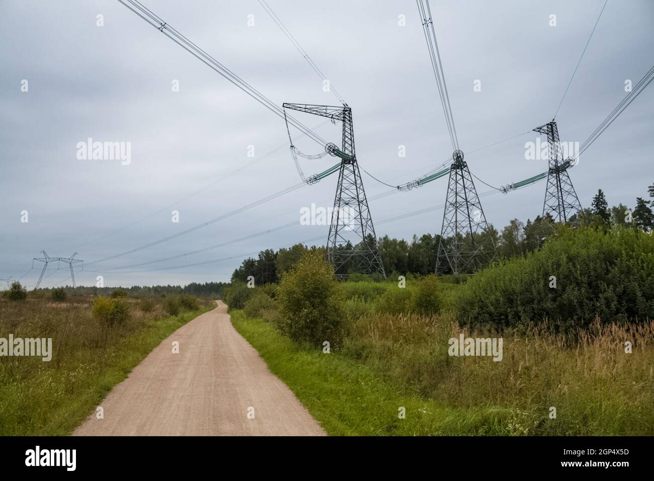 Power line supports. Electricity transmission and posts Stock Photo - Alamy