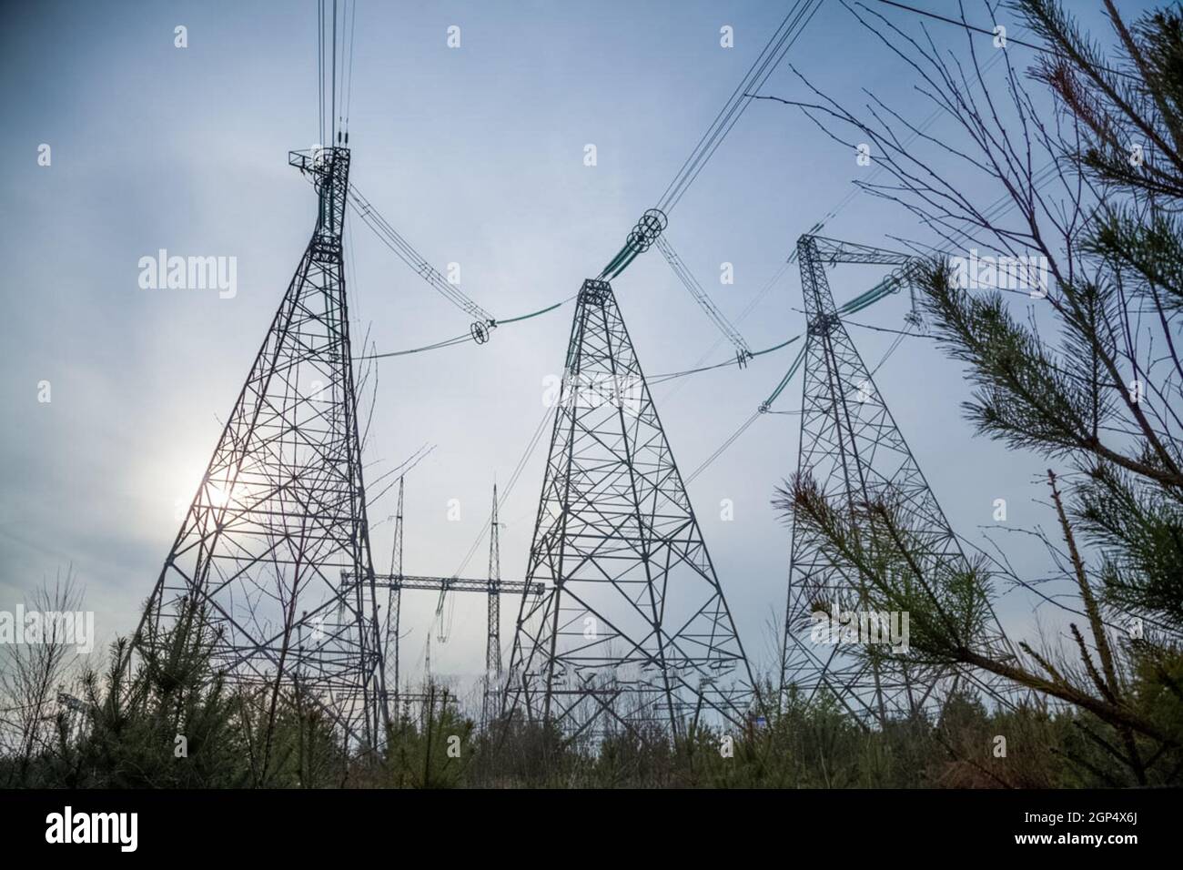 Power line supports. Electricity transmission and posts Stock Photo - Alamy