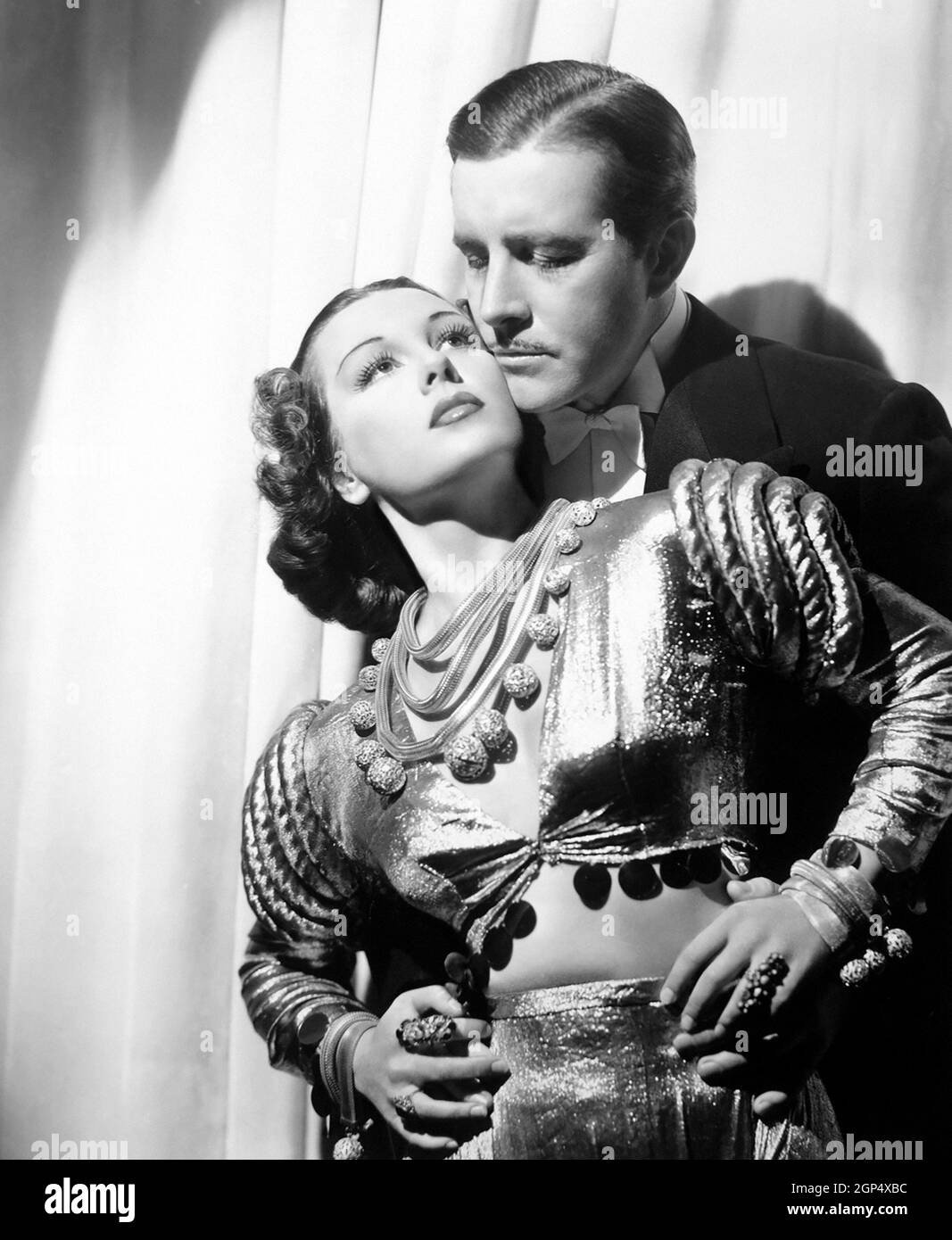 ROMANCE IN THE DARK, from left, Gladys Swarthout (in a costume by ...