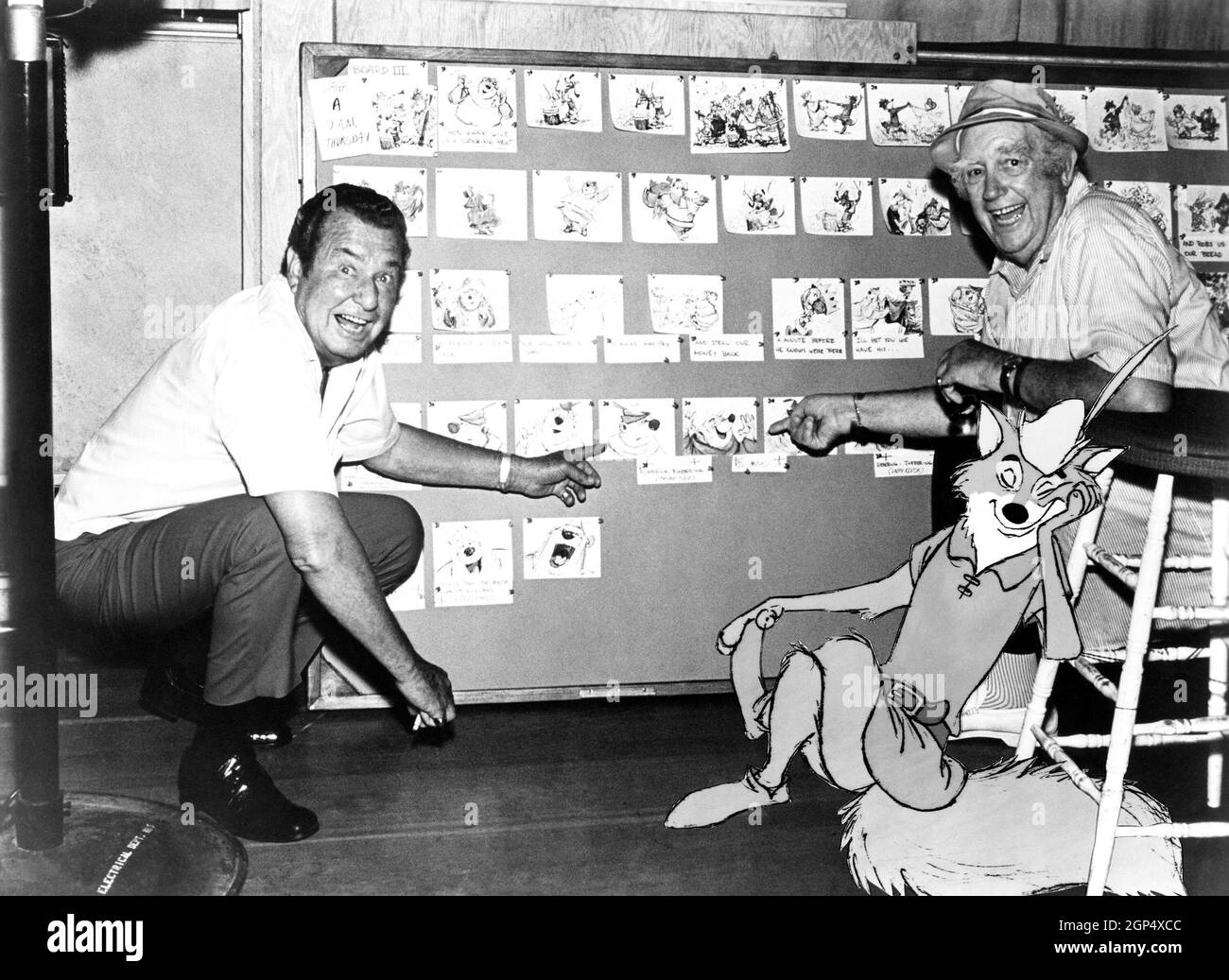 ROBIN HOOD, from left, voice actors Phil Harris, Andy Devine, at the ...