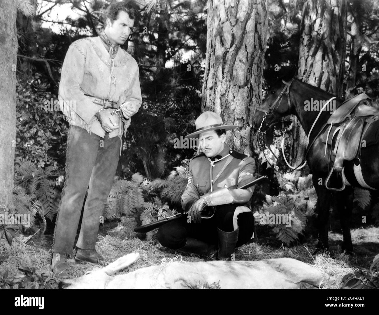 ROSE MARIE, from left, Fernando Lamas, Howard Keel, 1954 Stock Photo ...