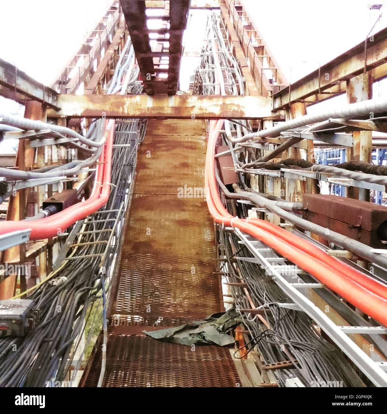 An overpass with cables and wires on an industrial estate Stock Photo ...