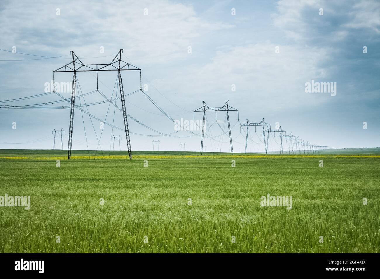 Power line supports. Electricity transmission and posts Stock Photo - Alamy