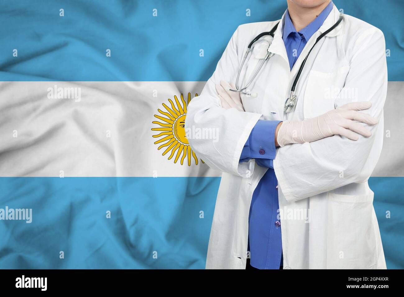 Doctor standing with the flag Stock Photo - Alamy