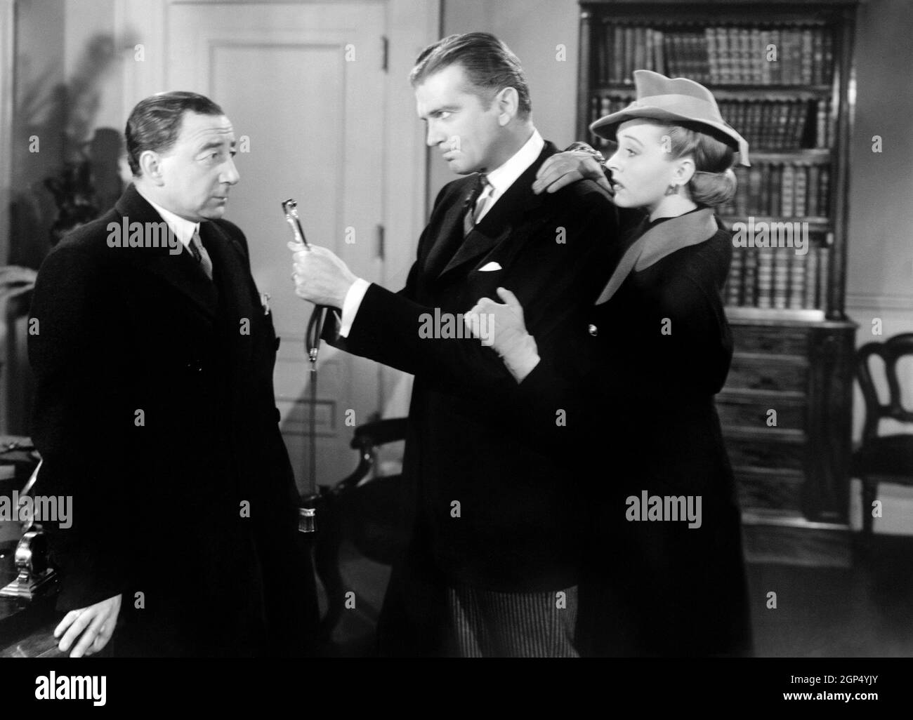 SCOTLAND YARD, from left, Melville Cooper, John Loder, Nancy Kelly ...