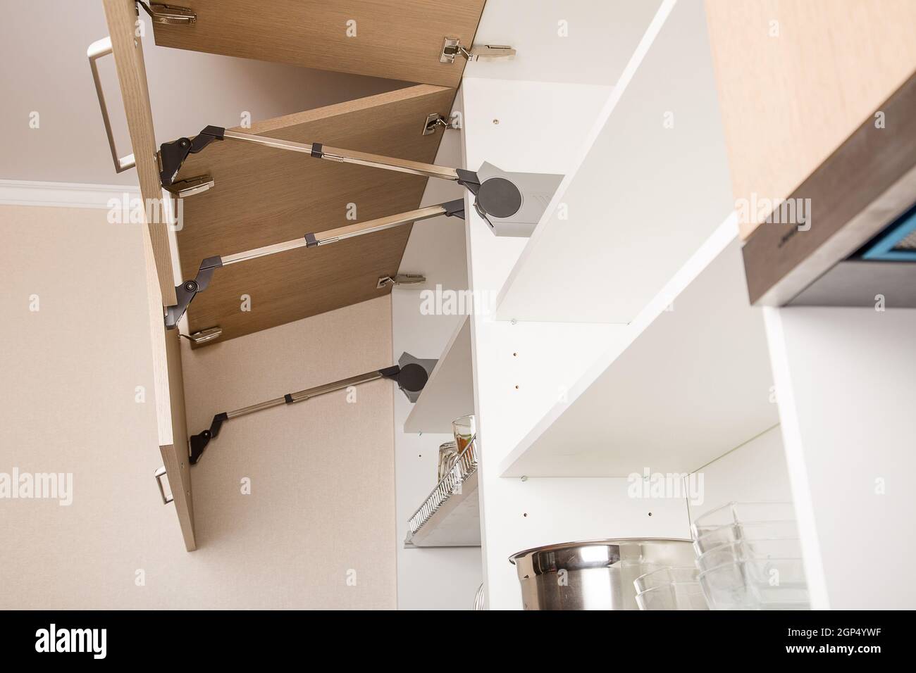 Elements of kitchen equipment in a modern home. Storage system in the ...