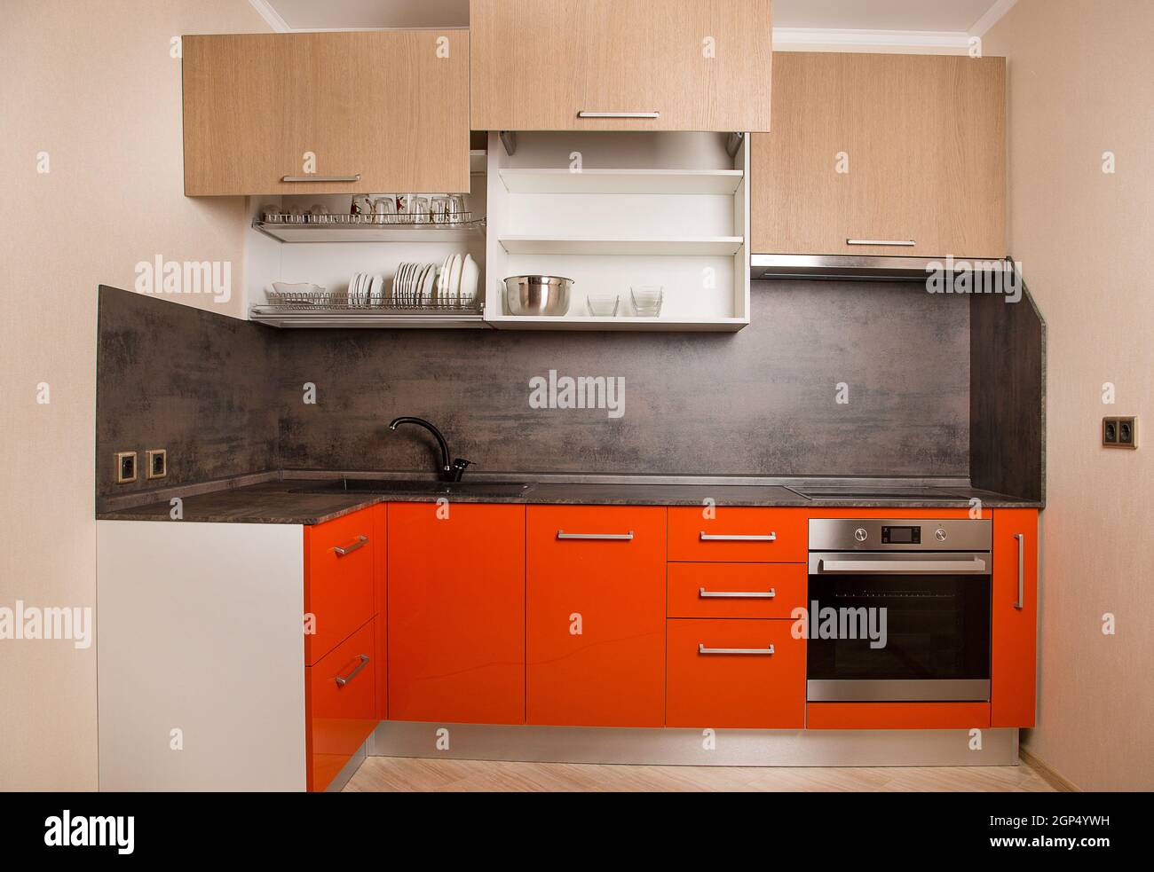 Elements of kitchen equipment in a modern home. Storage system in the ...