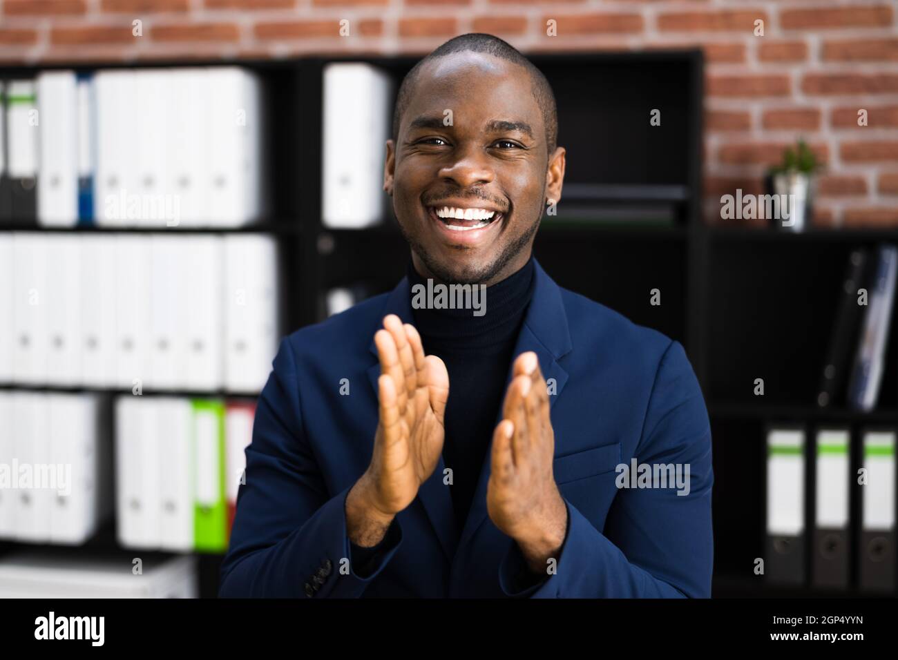 African American Business Man Applauding And Clapping Stock Photo - Alamy
