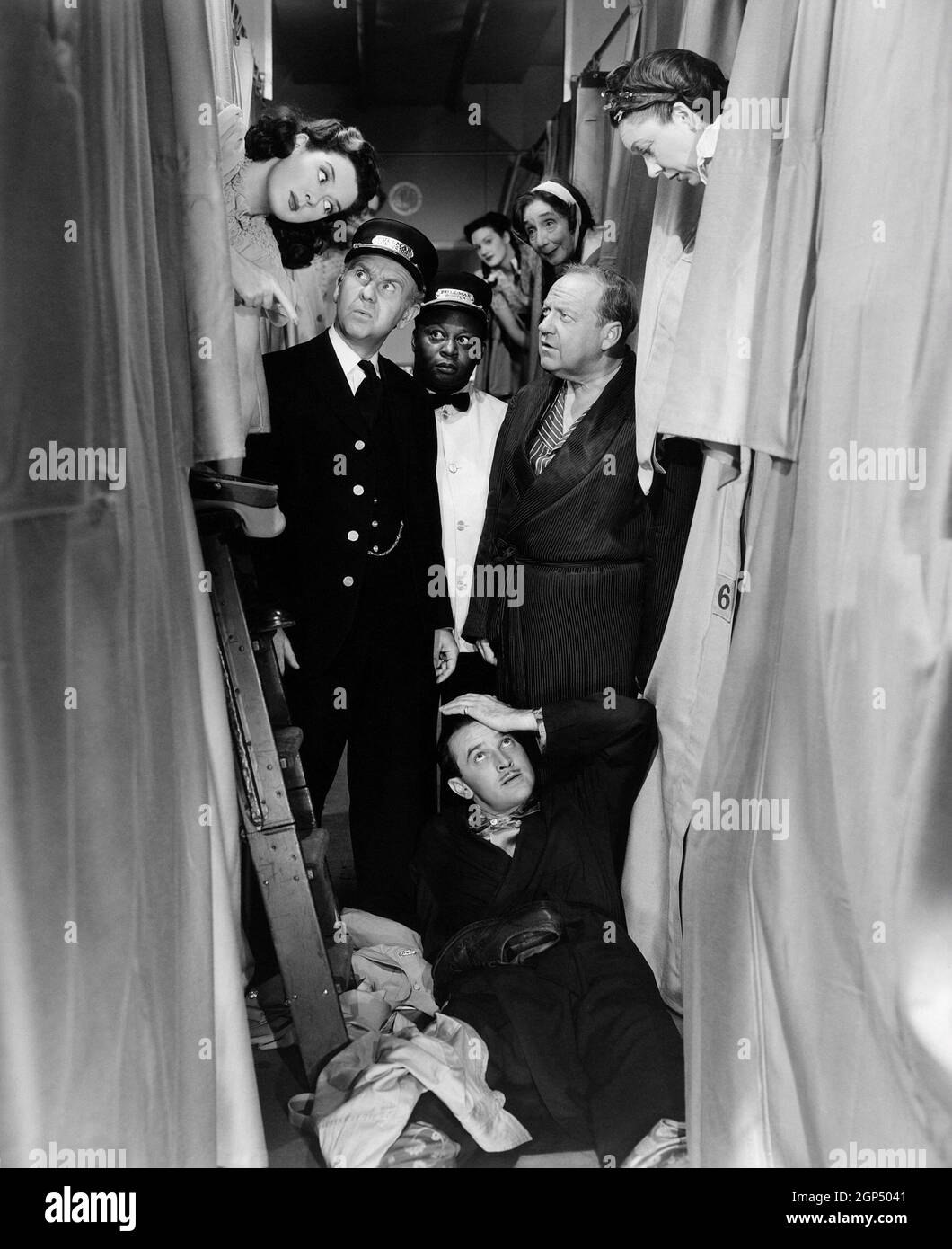 SHE WOULDN'T SAY YES, from left, foreground, Rosalind Russell, Charles ...