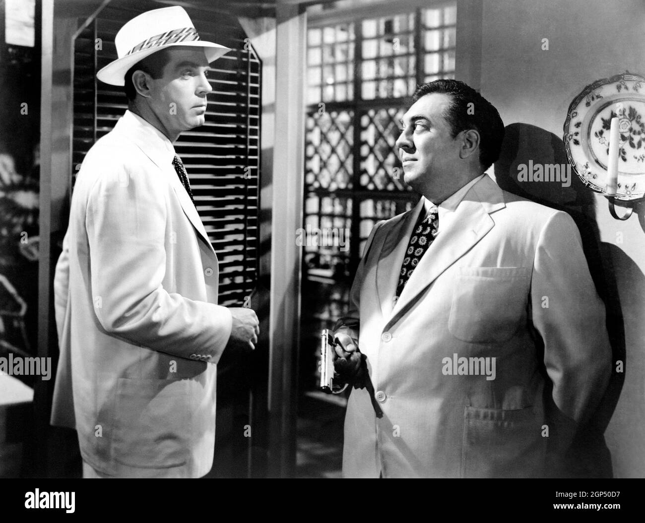 SINGAPORE, from left: Fred MacMurray, Thomas Gomez, 1947 Stock Photo ...
