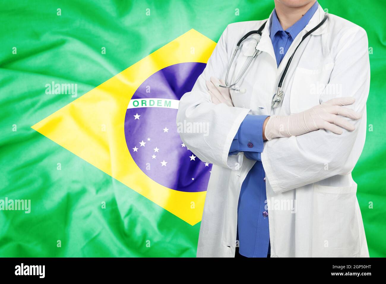 Doctor standing with the flag Stock Photo - Alamy