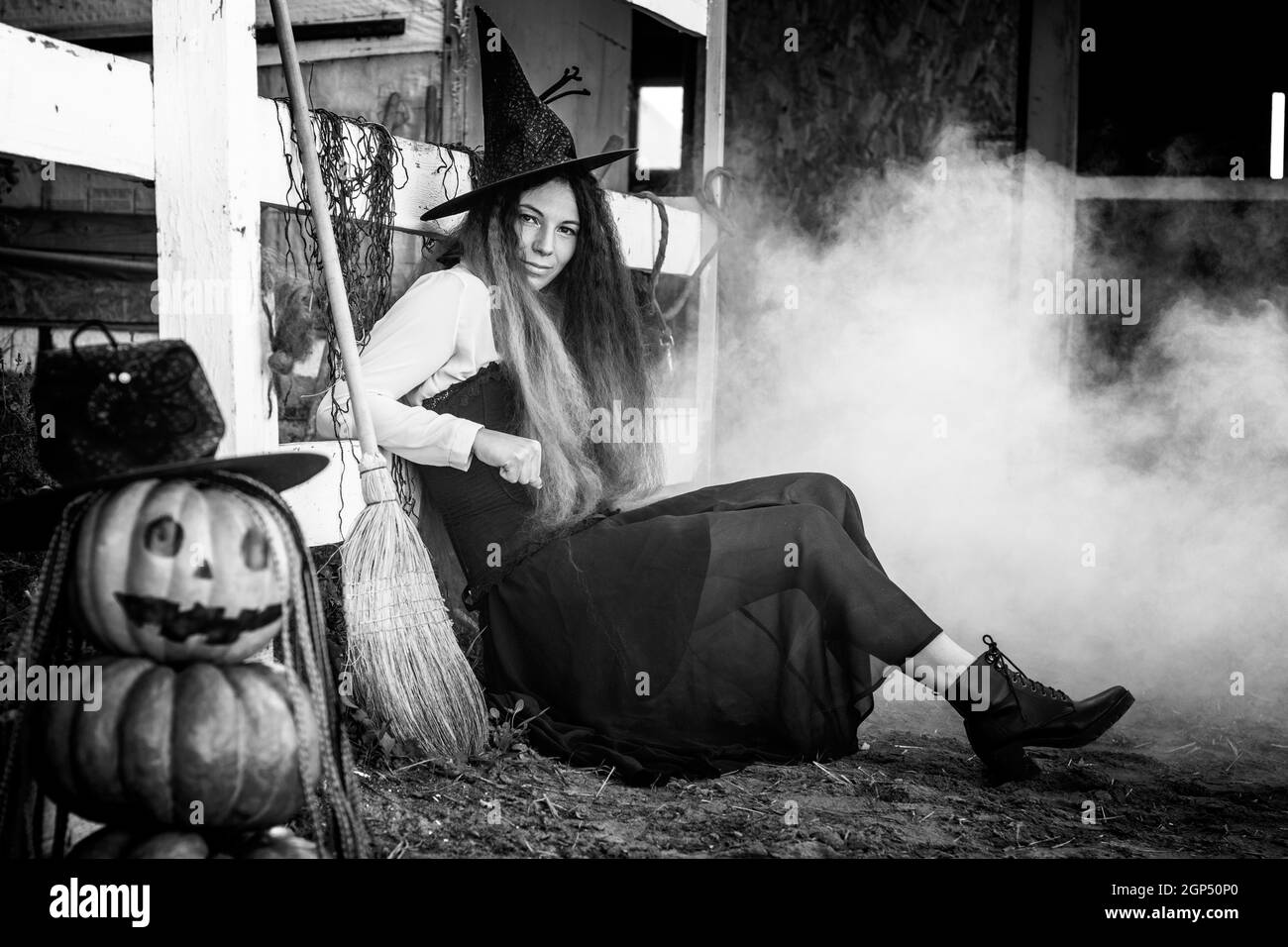 In the foreground there is a figure of pumpkins with a malicious face ...