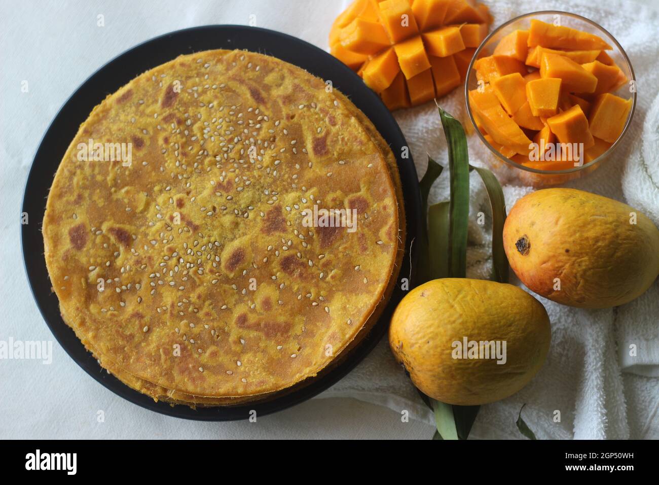 Mango Paratha. Indian flatbread made of wheat flour and mango pulp. A ...