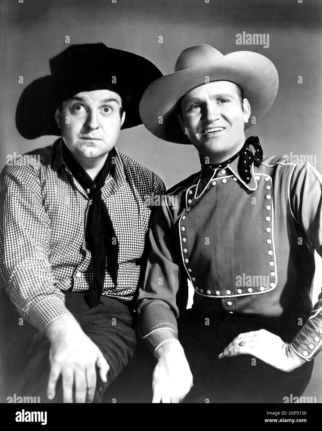 SOUTH OF THE BORDER, from left, Smiley Burnette, Gene Autry, 1939 Stock ...