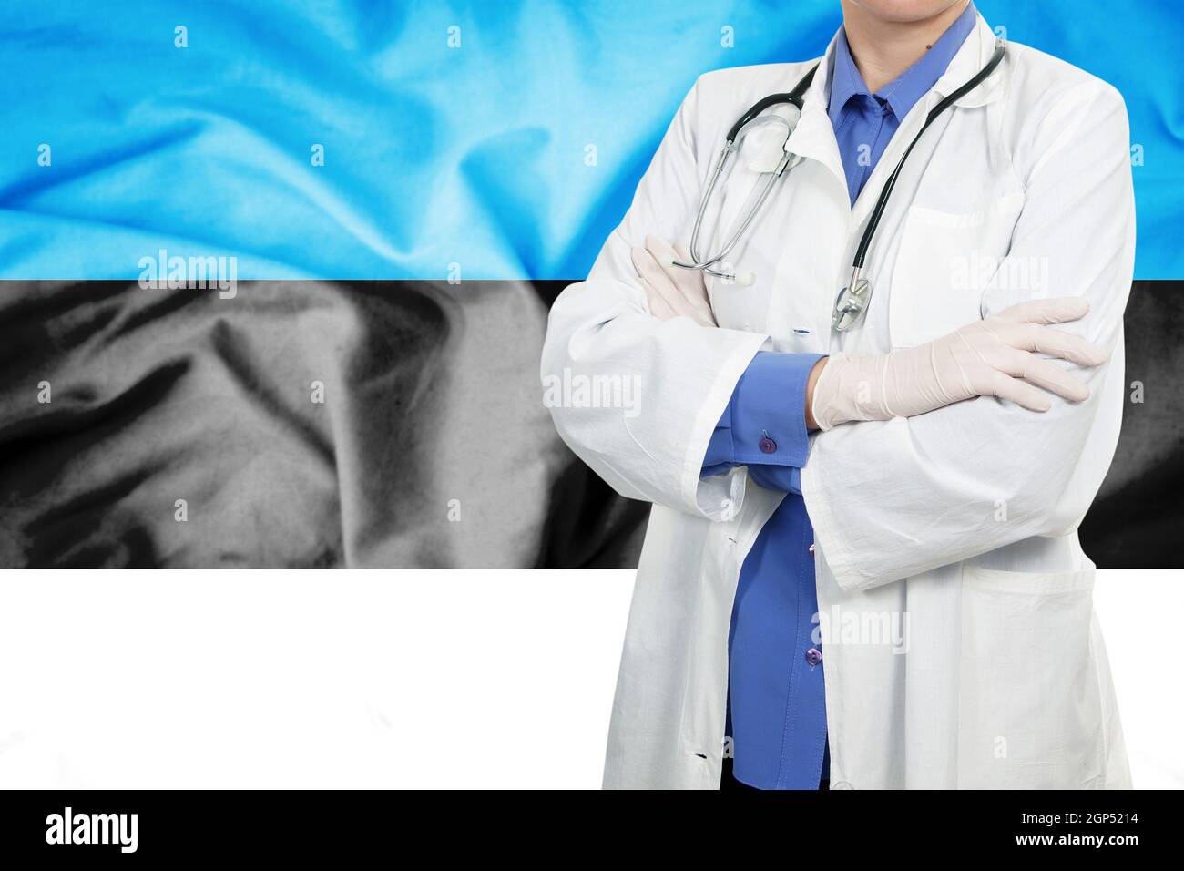 Doctor standing with the flag Stock Photo - Alamy