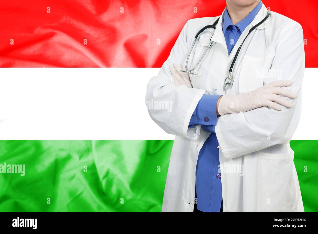 Doctor standing with the flag Stock Photo - Alamy