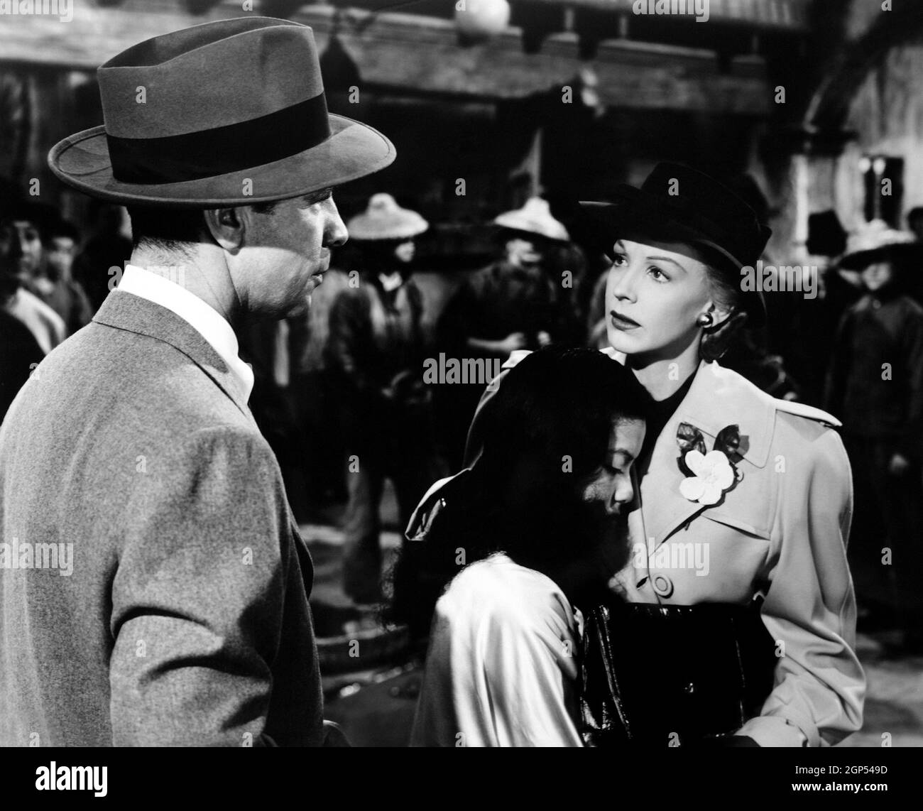 TO THE ENDS OF THE EARTH, from left, Dick Powell, Maylia (aka Gloria ...