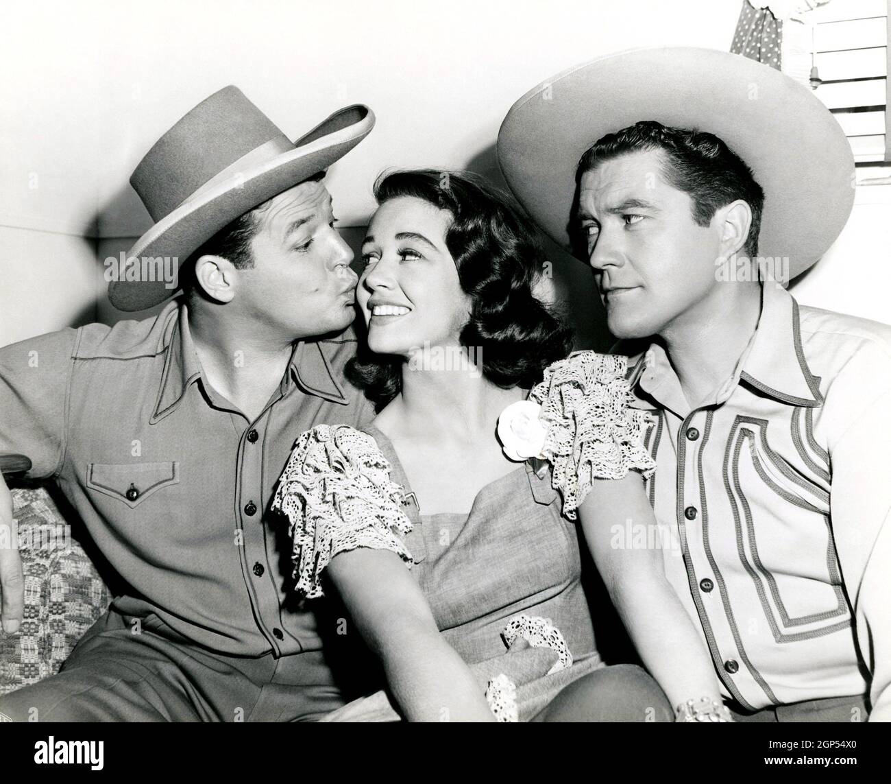 TWO GUYS FROM TEXAS, from left, Jack Carson, Dorothy Malone, Dennis ...