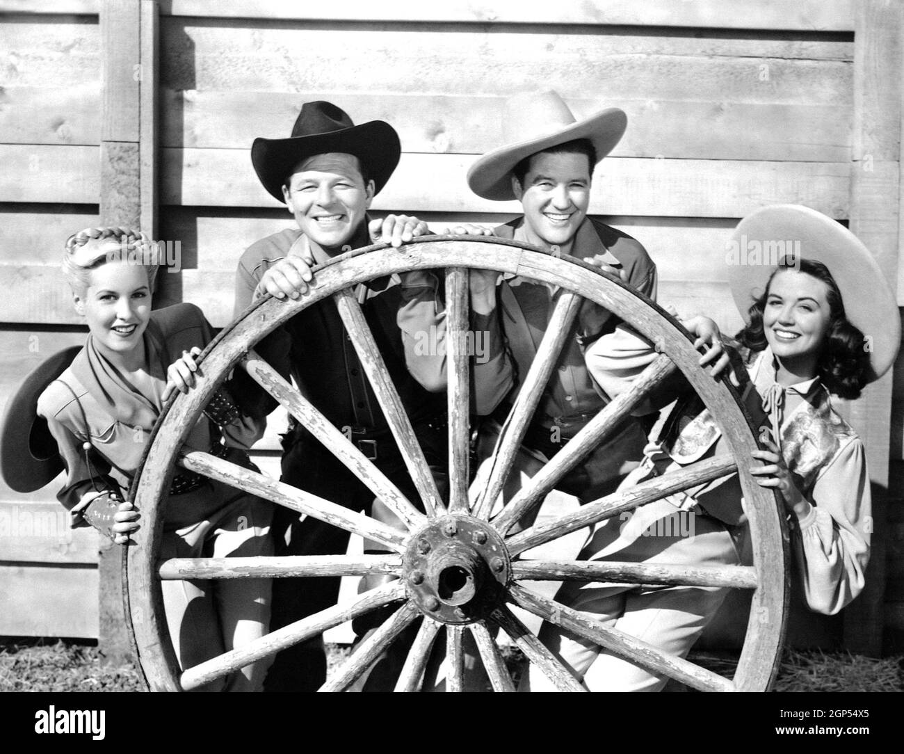 TWO GUYS FROM TEXAS, from left, Penny Edwards, Jack Carson, Dennis ...