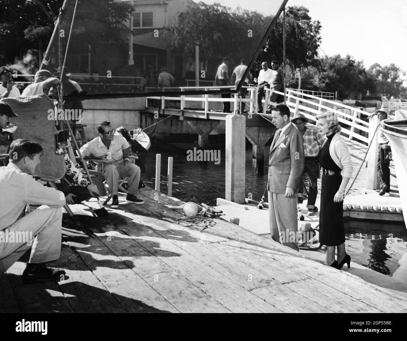 TWO OF A KIND, from left: director Henry Levin (seated rear), Alexander ...