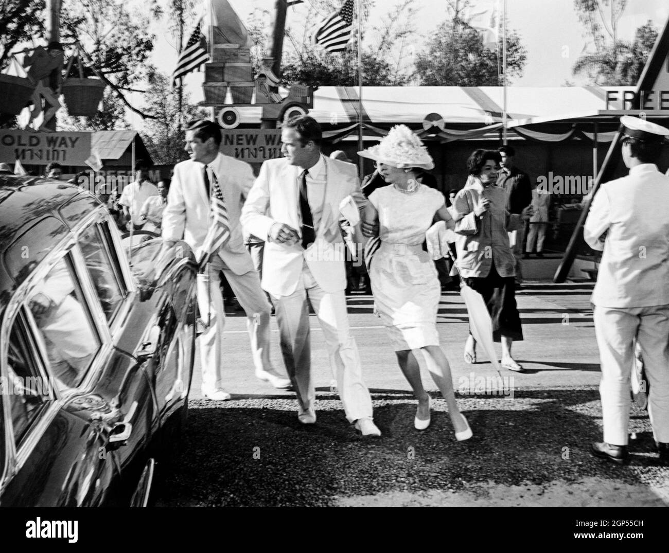 THE UGLY AMERICAN, from left, Arthur Hill, Marlon Brando, Sandra Church ...