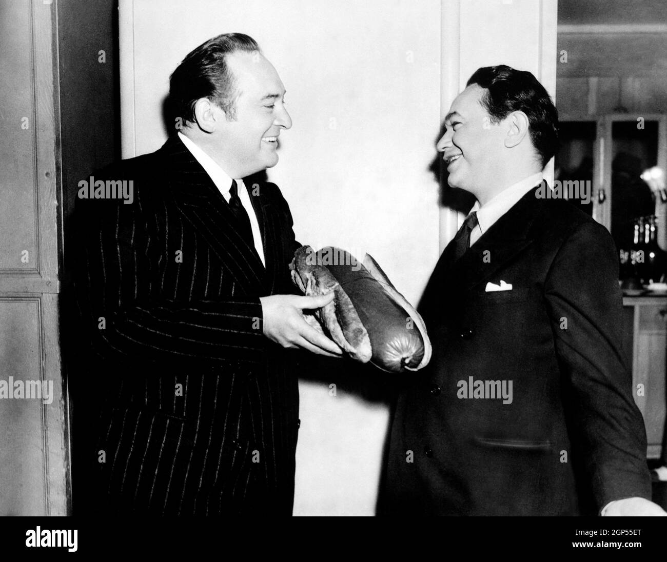 UNHOLY PARTNERS, Edward Arnold, left, impressing Edward G. Robinson ...