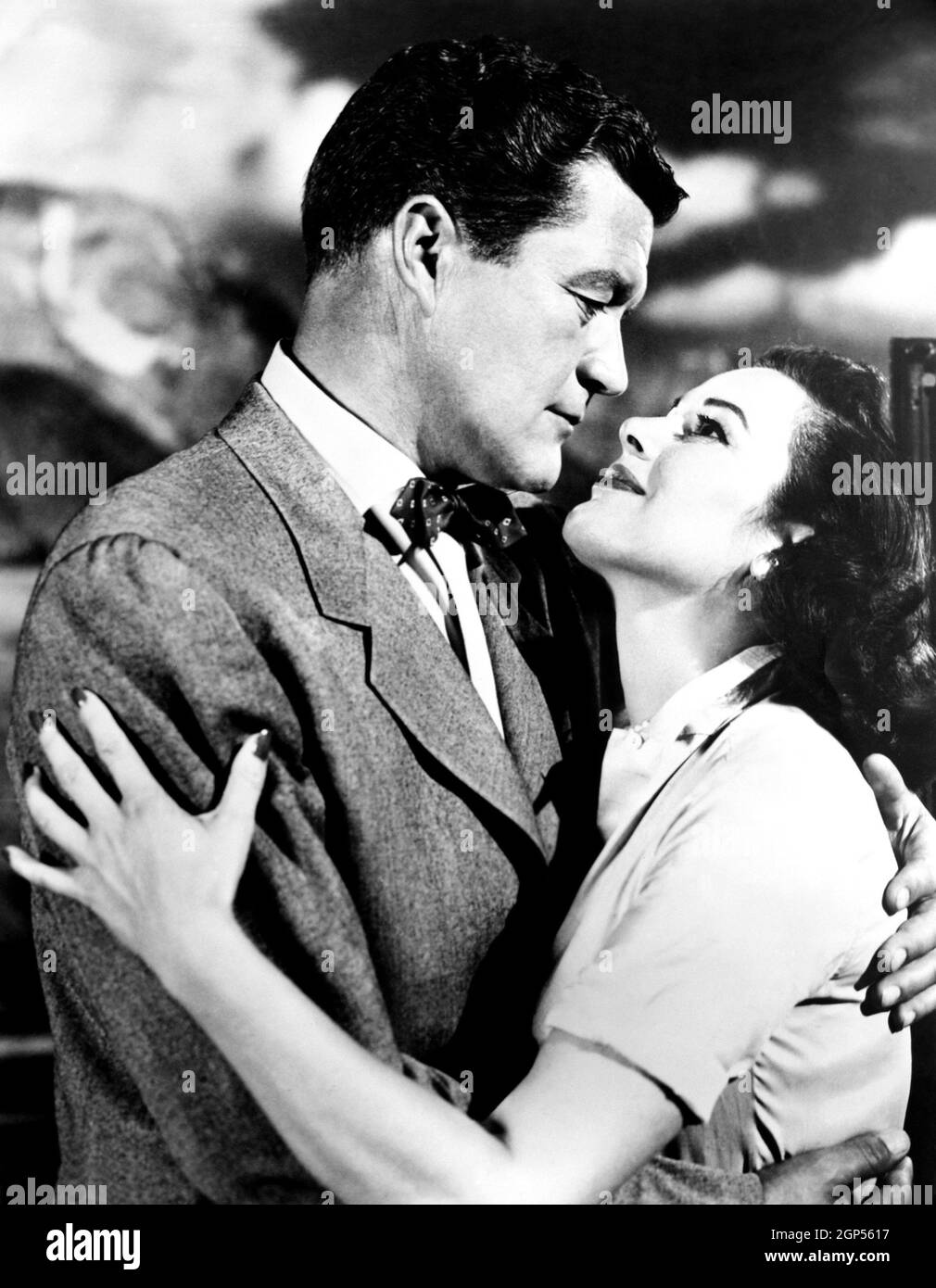 URANIUM BOOM, from left, Dennis Morgan, Patricia Medina, 1956 Stock Photo - Alamy