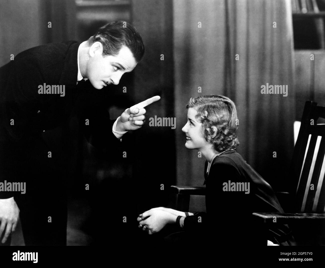 WHAT A MAN, from left, Reginald Denny, Miriam Seeger, 1930 Stock Photo ...