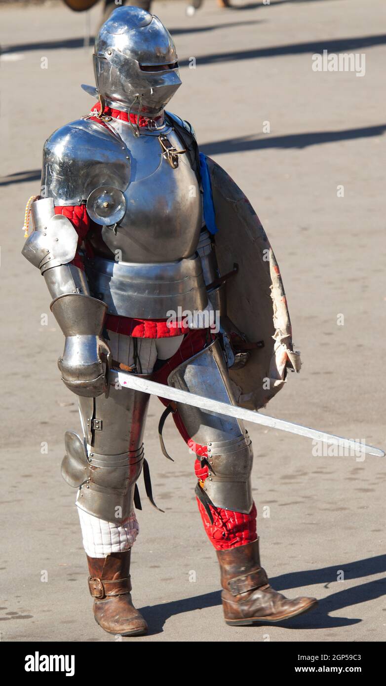 RUSSIA, MOSCOW - MARCH 14: Unidentified knight with a sword in armor on ...