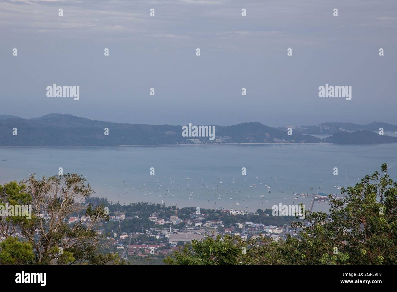 Big bay in Phuket for tourists, top view. Blue sea with pier and jetty ...