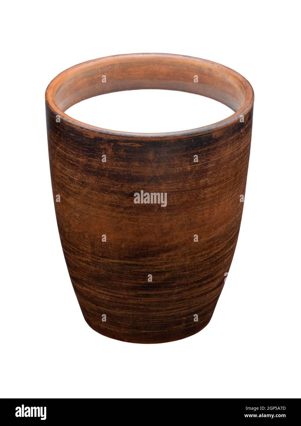 simple rough clay mug without handle with milk isolated on white ...