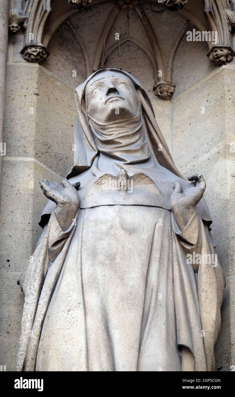 Saint Scholastica, statue on the portal of the Basilica of Saint ...
