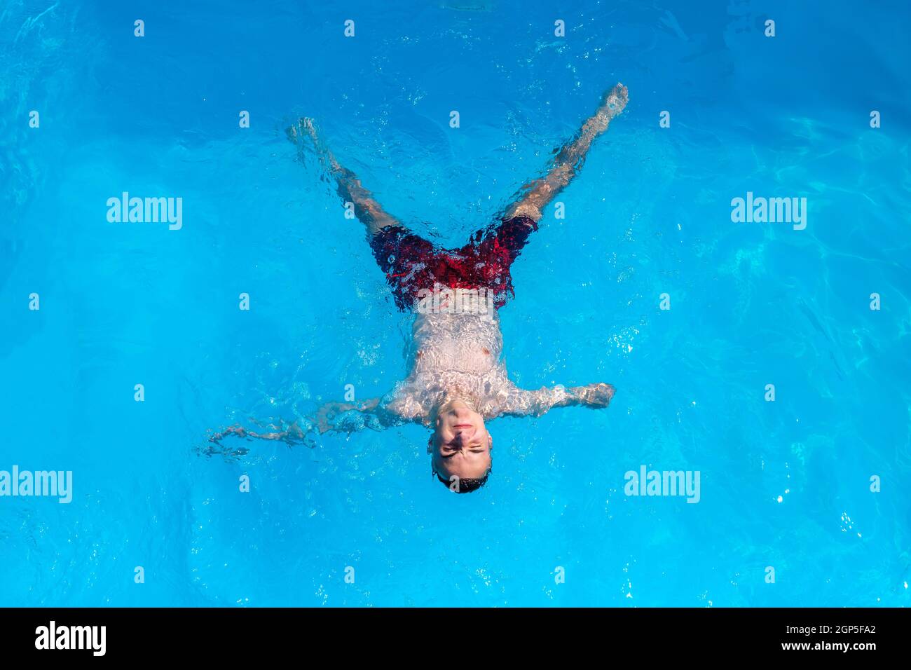 Disabled man chilling in swimming pool Stock Photo - Alamy
