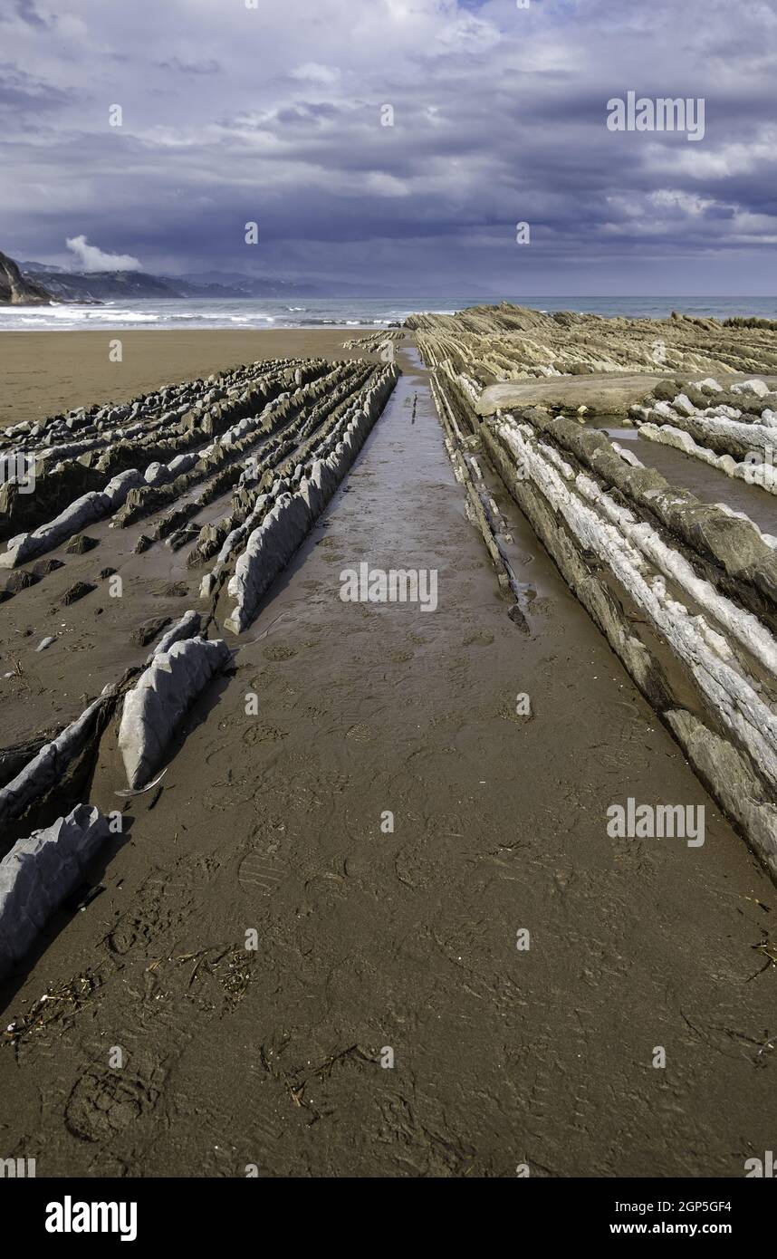 Detail of famous rock formation on a beach, erosion and nature, tourist ...