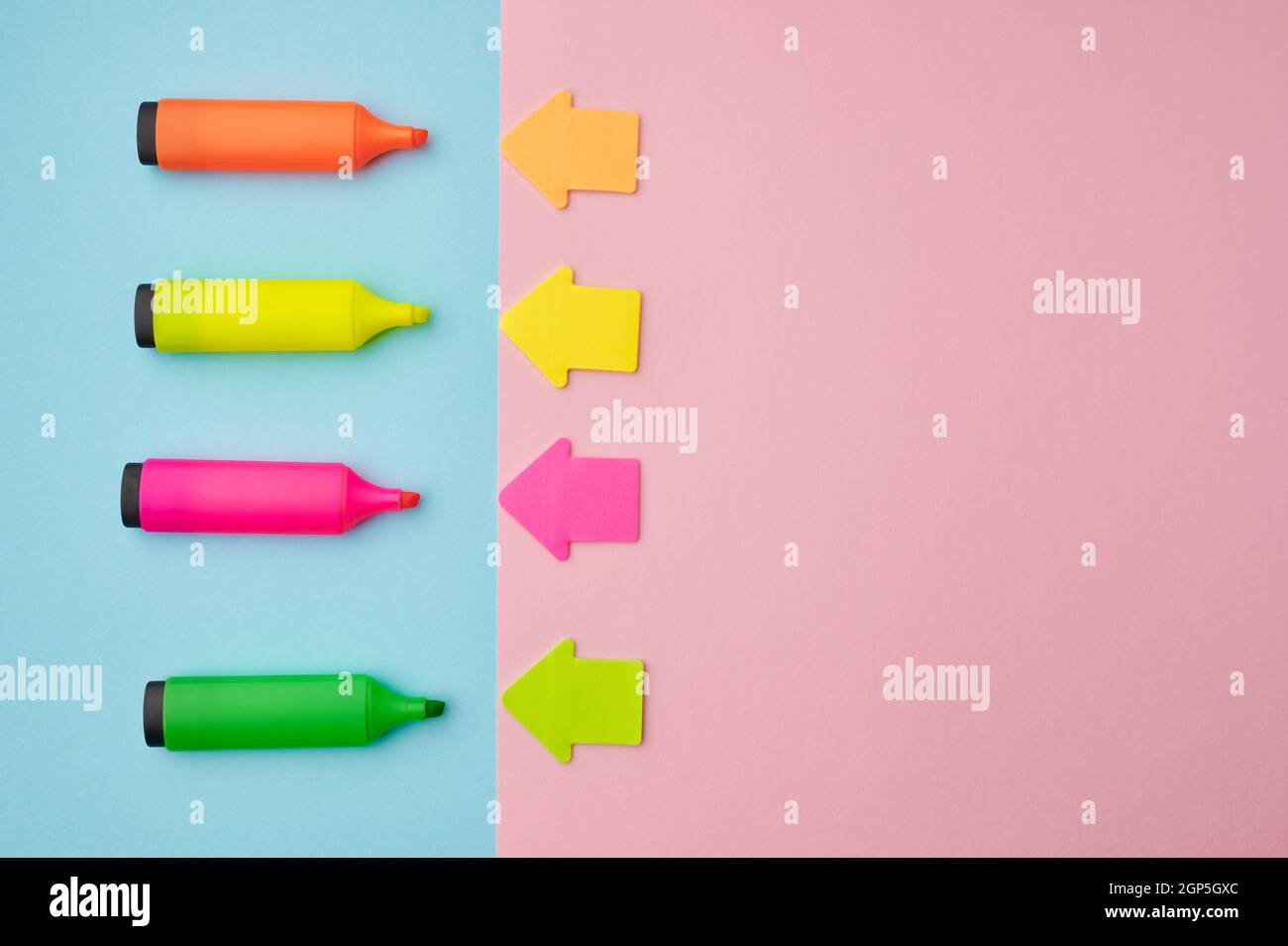 Set of opened colorful permanent markers and magnetic arrows. Office ...