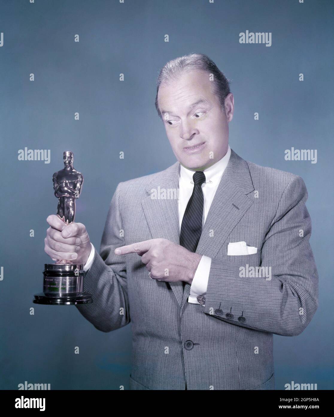 Bob Hope, who often hosted the Academy Awards presentation, holding an ...