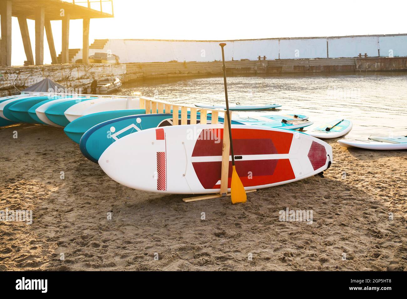 SUP Surf boards on beach early in the morning Stock Photo - Alamy