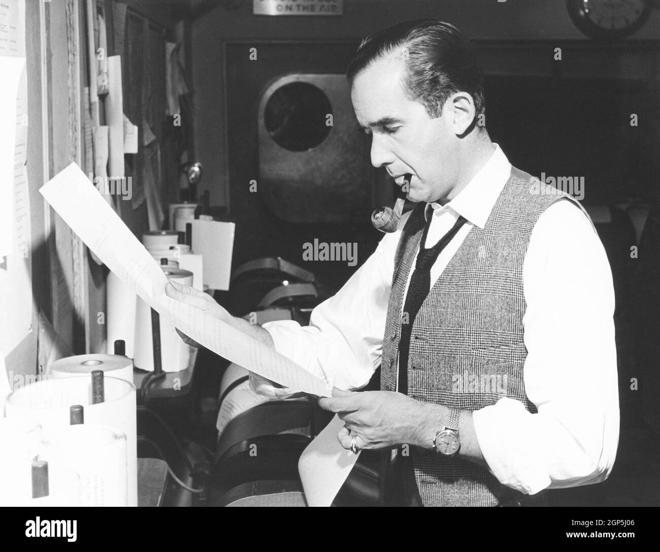 Edward R. Murrow, newscaster for CBS, ripping news off the wire, circa ...
