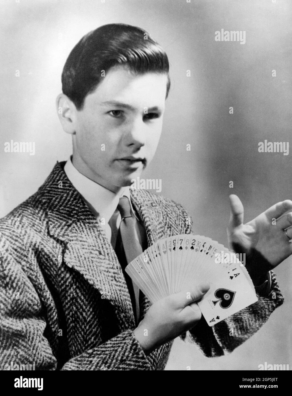 Johnny Carson, performing card tricks, as 'The Great Carsoni', ca. late ...