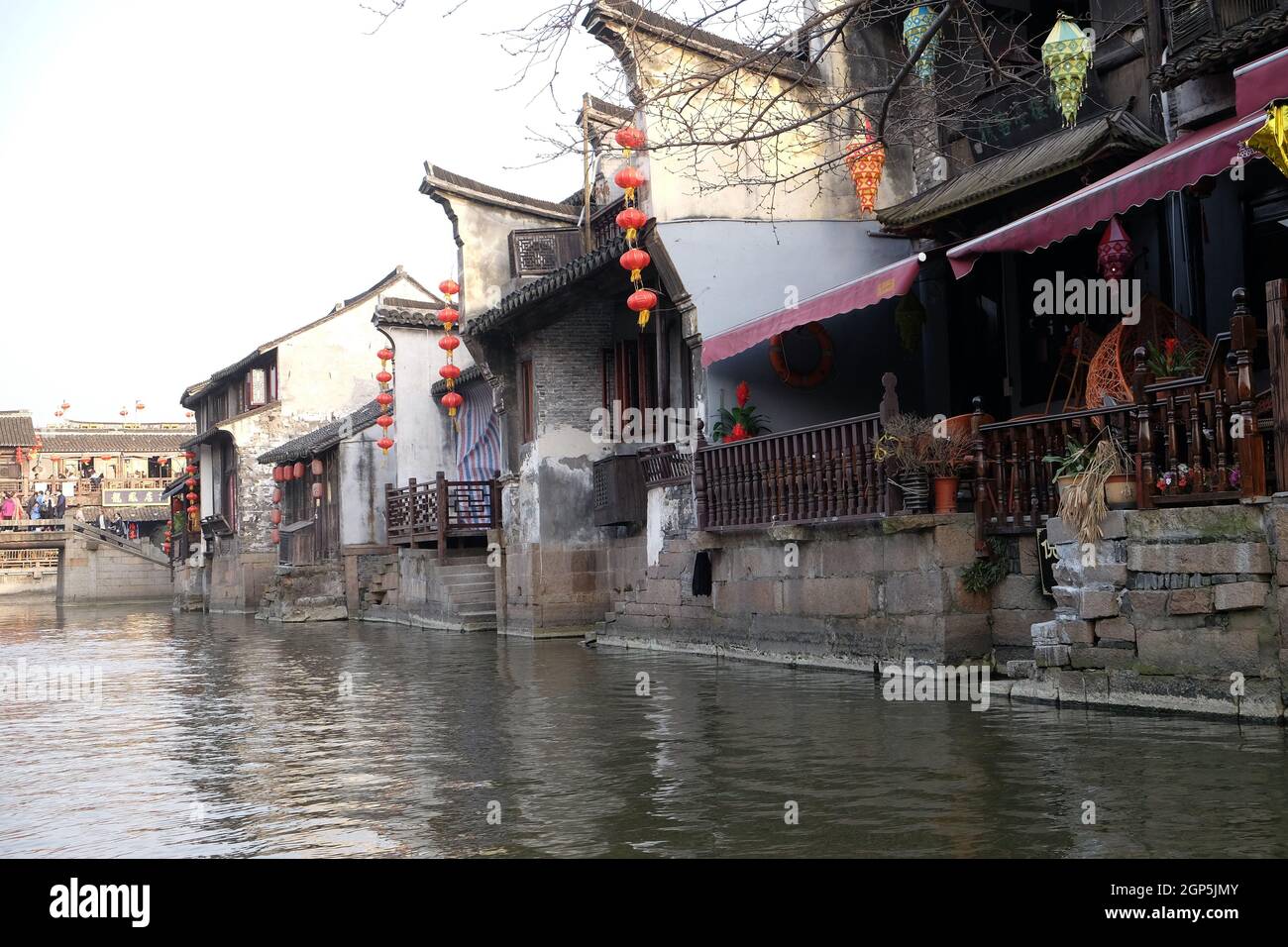 The Chinese architecture and buildings lining the water canals to ...