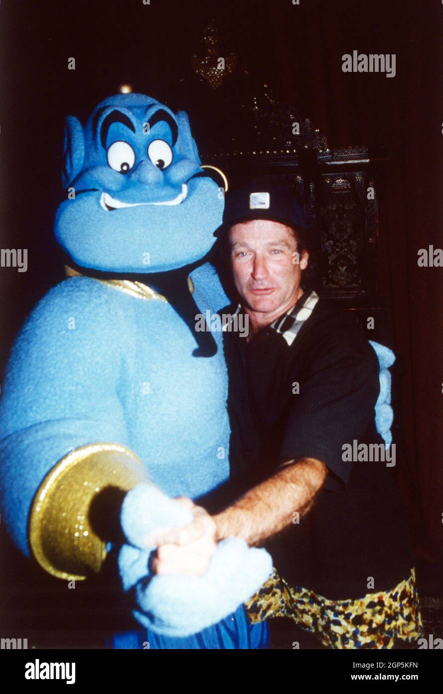 Robin Williams, with Genie from Aladdin, 1990s. / TV Guide / Courtesy ...