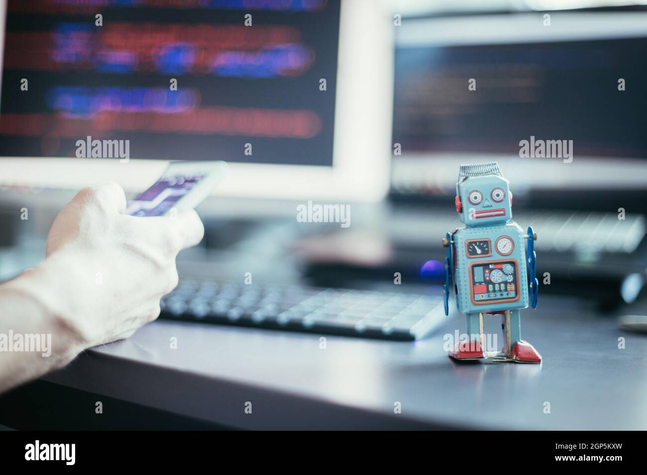 Symbol for a chatbot or social bot and algorithms, program code in the ...