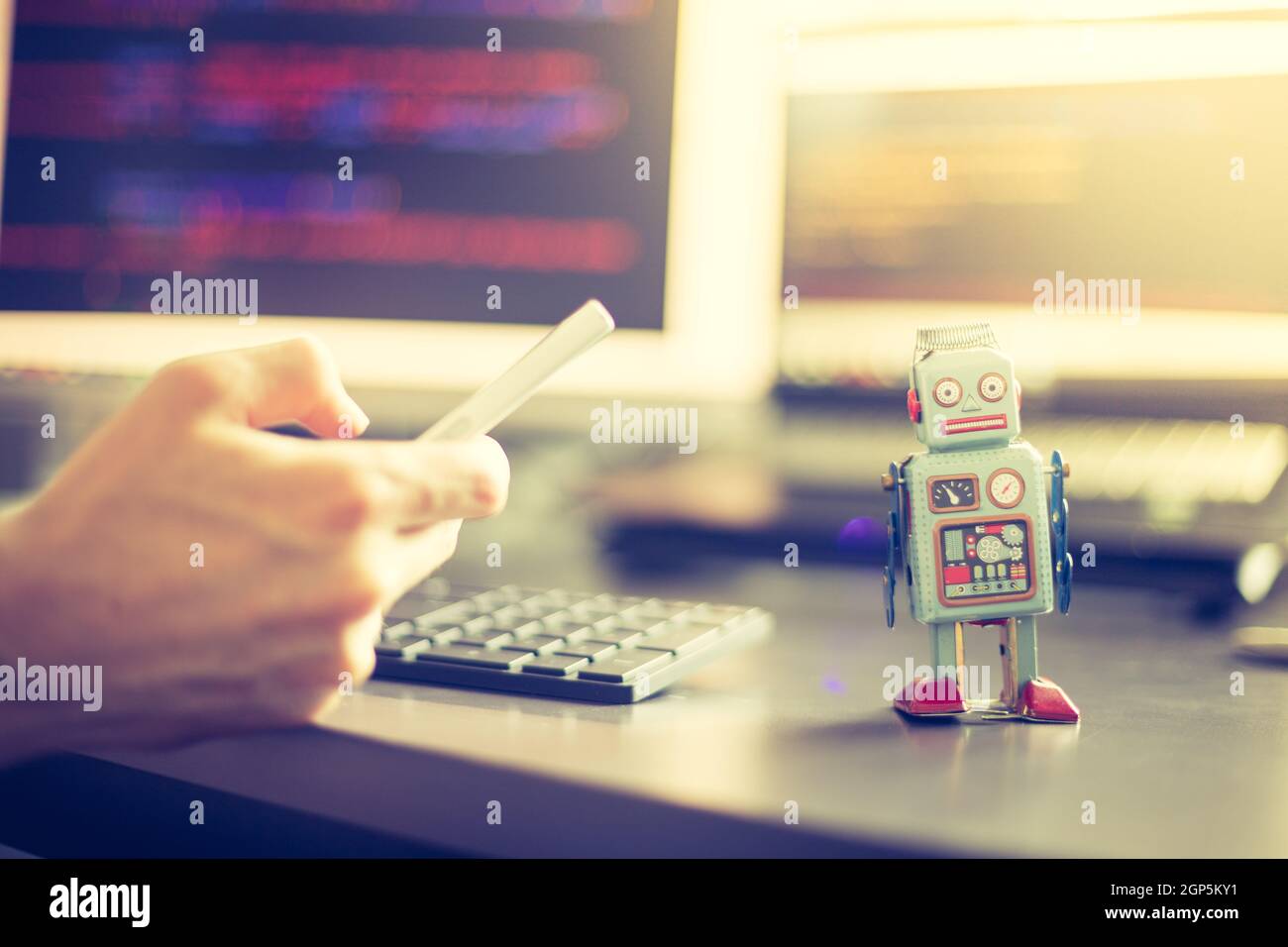 Symbol for a chatbot or social bot and algorithms, program code in the ...