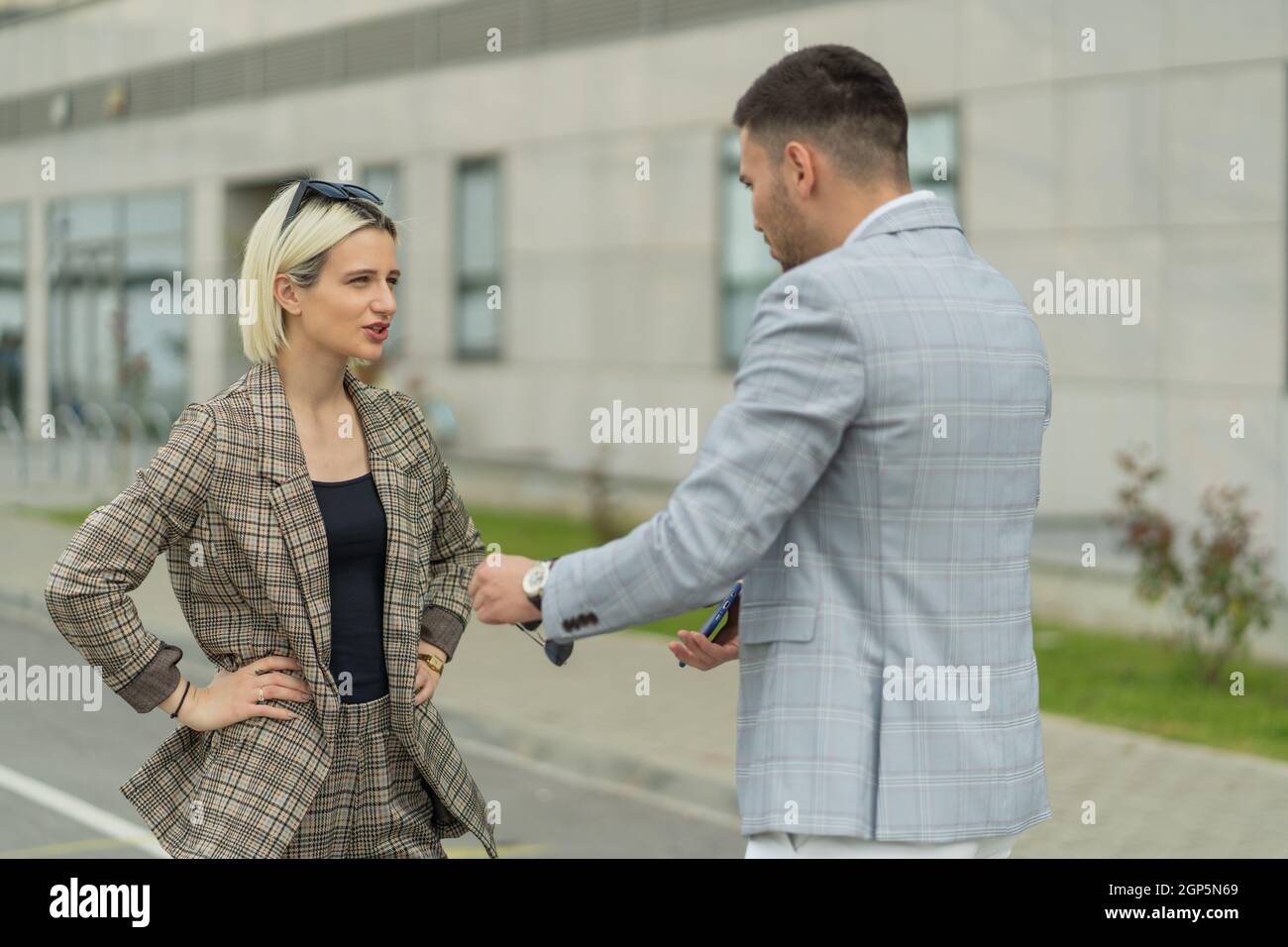 Two business people are discussing the problems in the company Stock ...