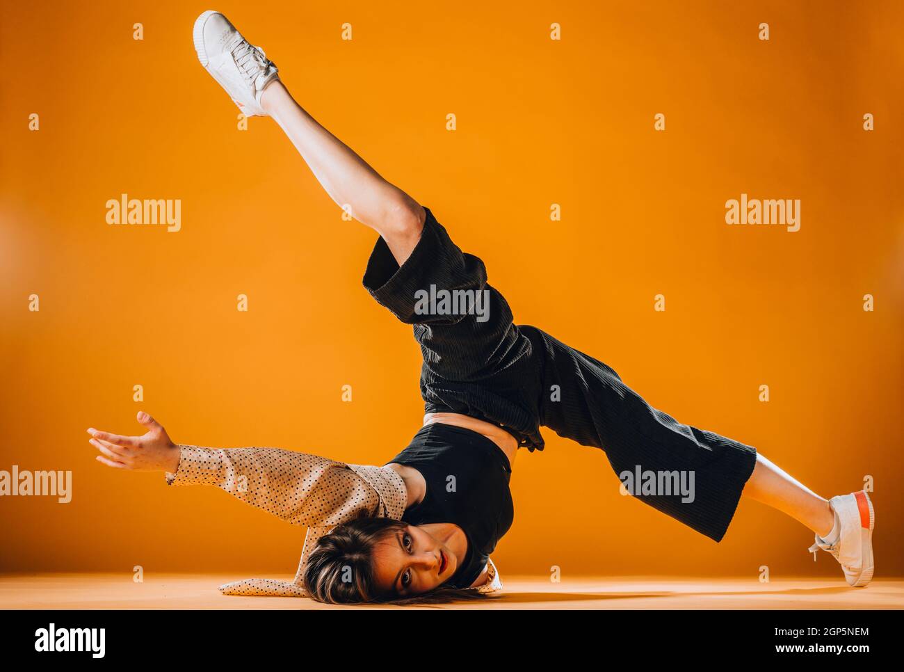 Modern dancing woman performing modern style dance moves Stock Photo ...