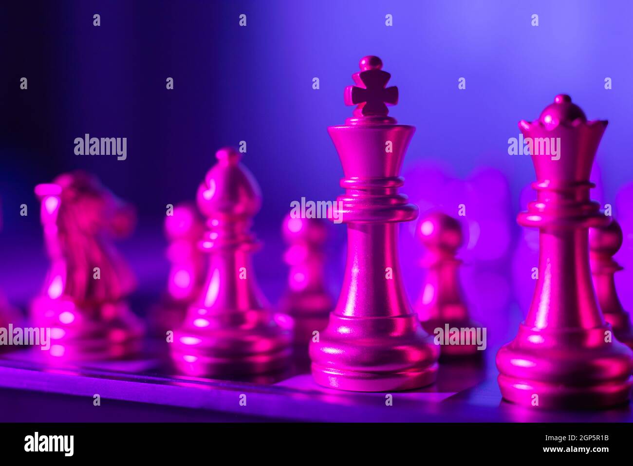 Pink chess pieces and pawns are on the board Stock Photo - Alamy
