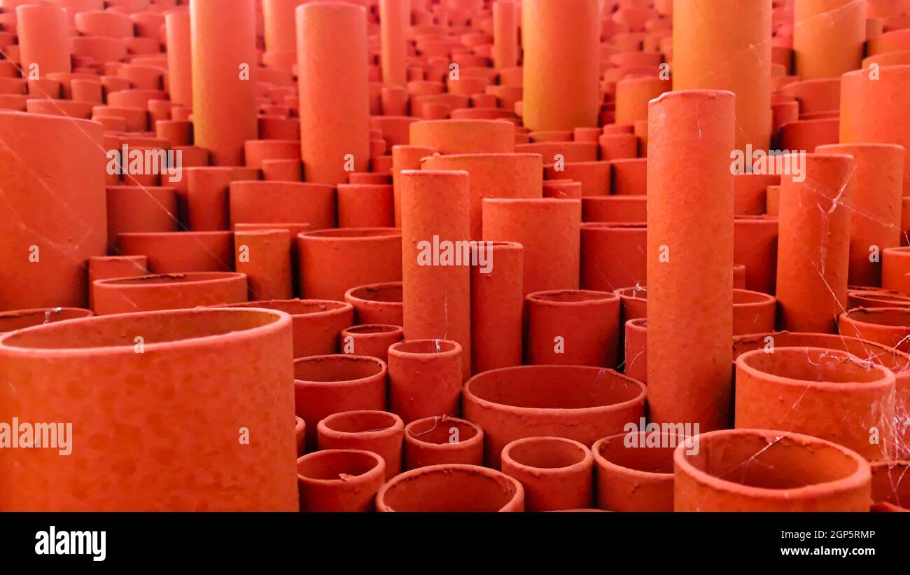 Red colors tubes pattern texture background Stock Photo - Alamy