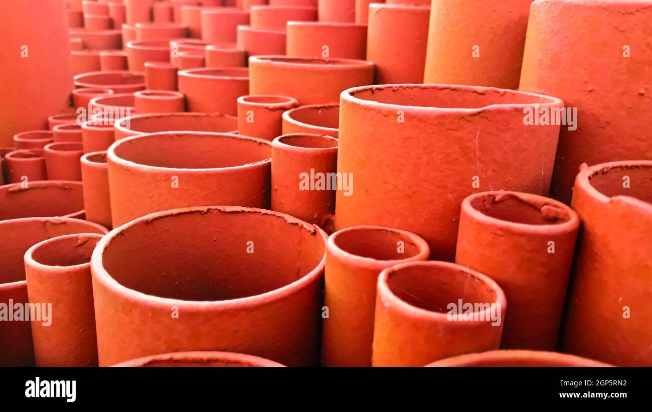 Red colors tubes pattern texture background Stock Photo - Alamy